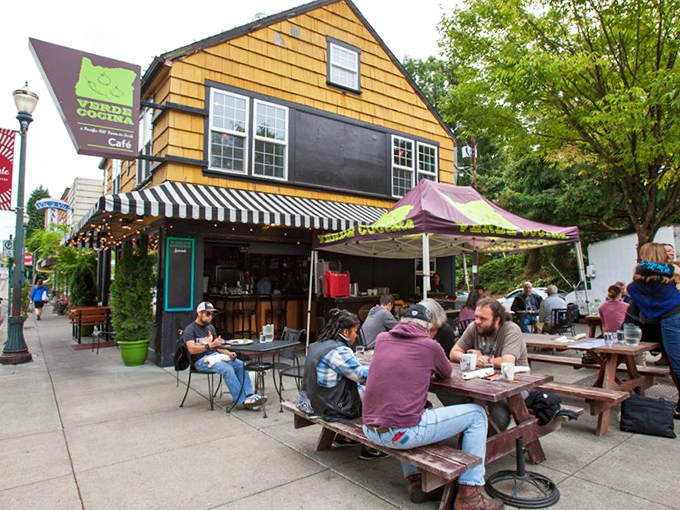 The outdoor seating area transforms sidewalk dining into a community experience. In Portland, eating outside is both an act of optimism and defiance.