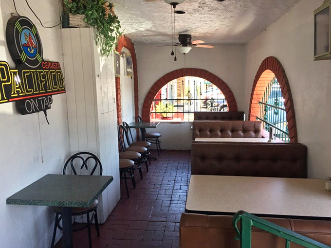 The patio seating area offers a quieter dining experience with the same soul-satisfying food. Note the Pacifico sign—always a good sign.
