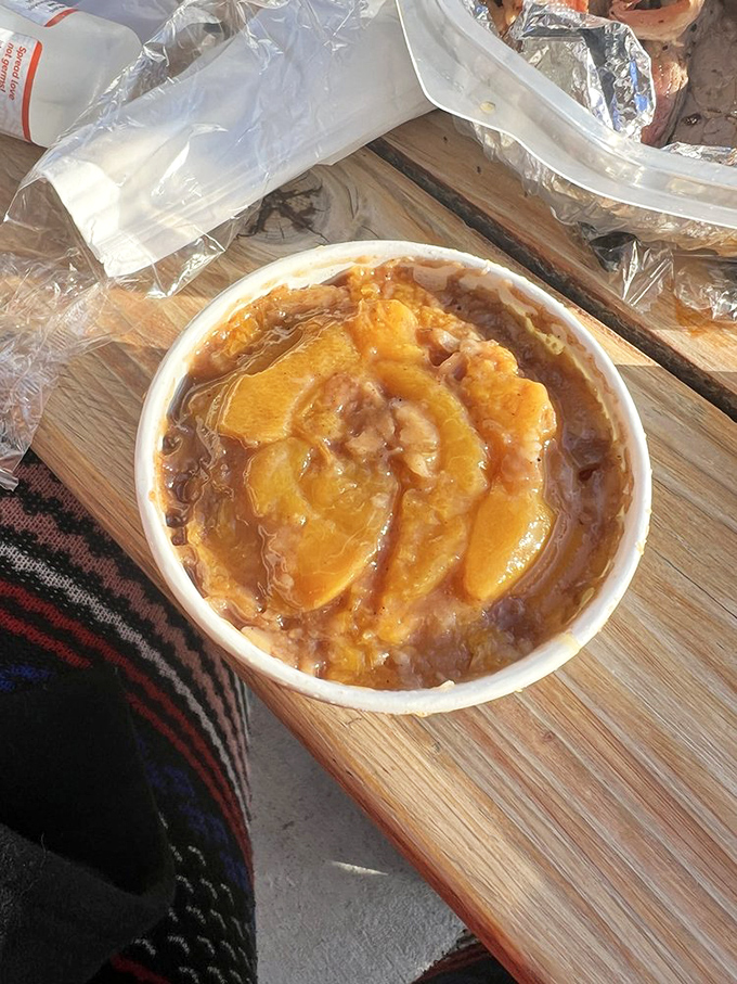 This peach cobbler isn't just dessert—it's the sweet, warm finale to a barbecue symphony that deserves a standing ovation.