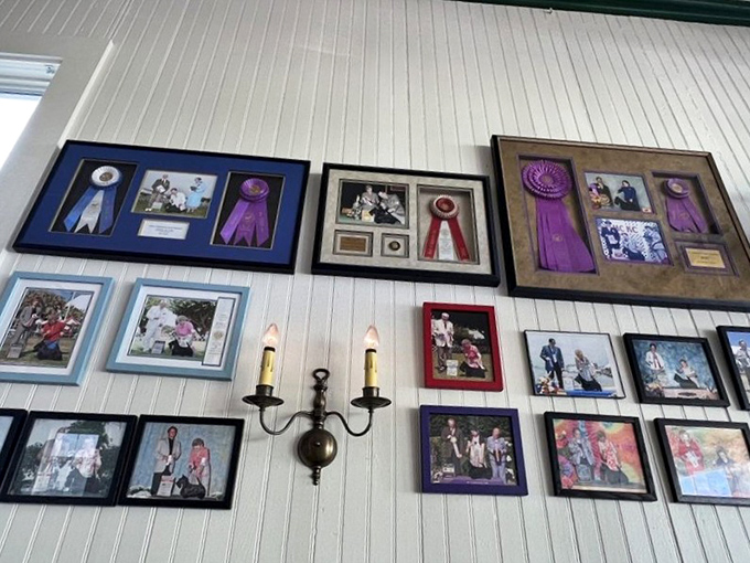 The wall of awards and family photos tells a story of pride, tradition, and the kind of culinary achievements that can't be faked or franchised.