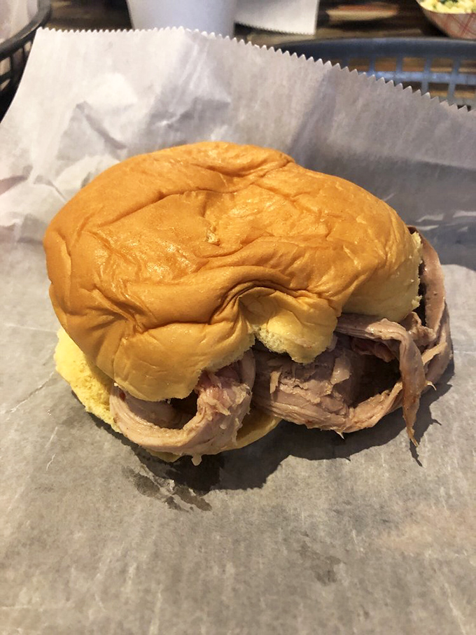 The humble pulled pork sandwich—proof that simplicity executed perfectly will always beat complexity fumbled, especially on a fresh bun.