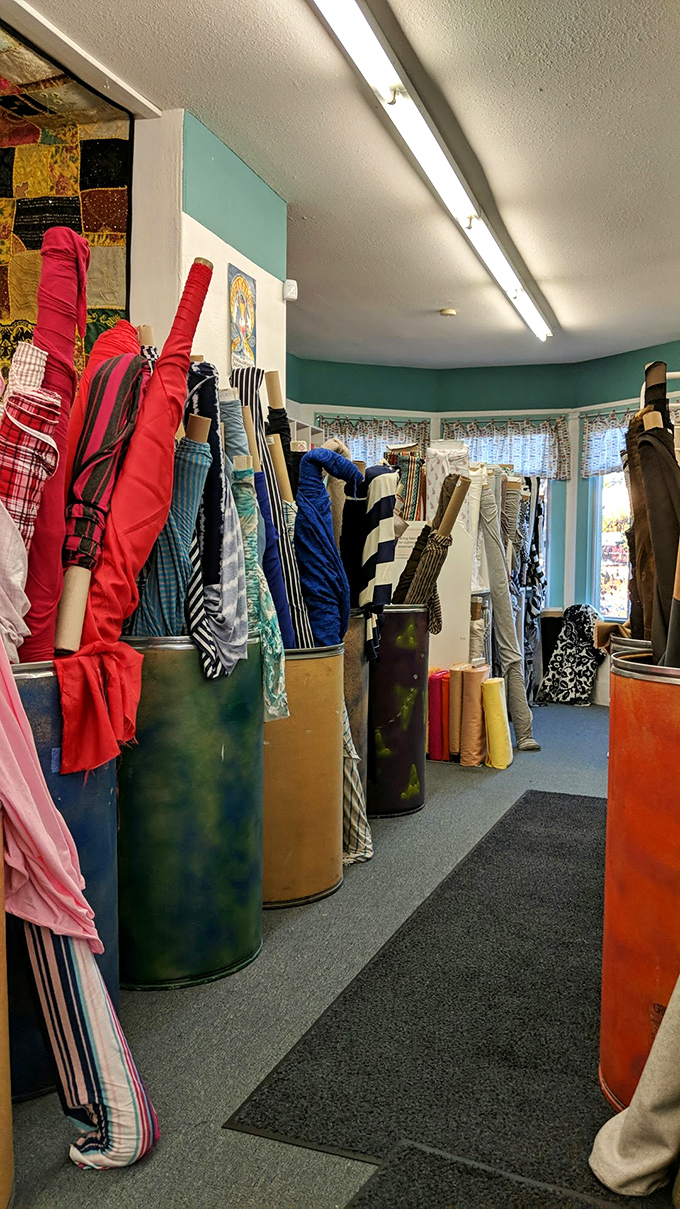 Fabric corridors create a textile labyrinth where getting pleasantly lost leads to unexpected creative inspiration and project epiphanies.