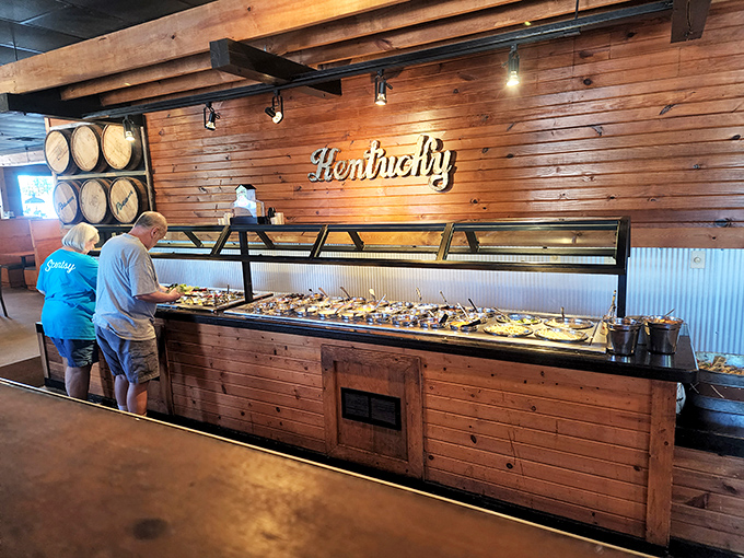 The salad bar proudly proclaims "Kentucky" above it, as if to say "yes, we know our steaks, but we respect our vegetables too."