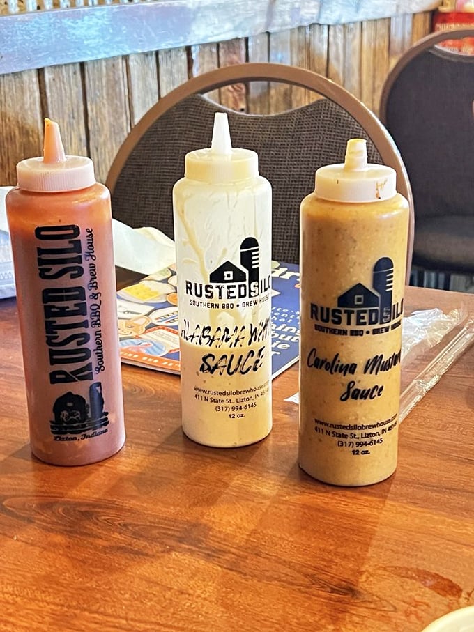 The sauce trinity&mdash;each squeeze bottle a different path to flavor enlightenment. Choose your adventure or try all three. No judgment here.