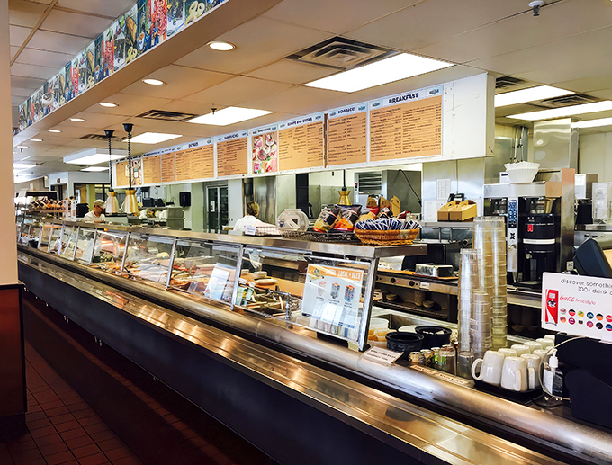 The dining room's understated decor and historical photos whisper stories of generations who've broken bread here, while you focus on breaking into that sandwich.