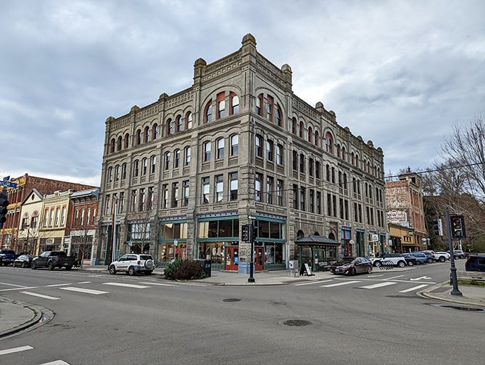 The Eisenbeis Building anchors downtown with imposing grandeur, its ornate stonework a testament to the optimism of Port Townsend's founders.