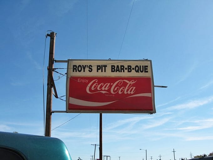 The vintage Coca-Cola sign has likely guided hungry travelers to Roy's for decades, like a North Star for barbecue pilgrims.