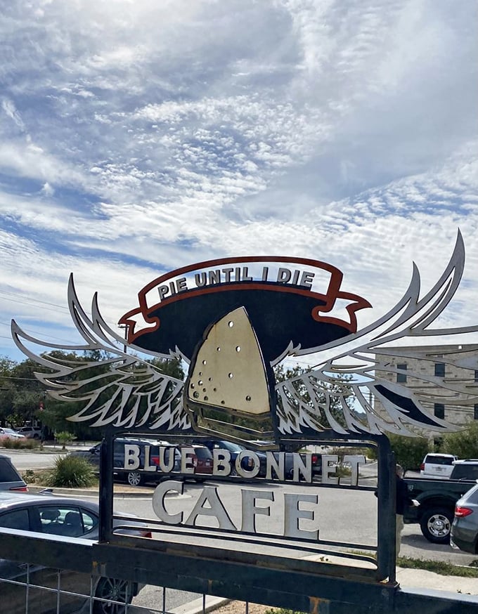 "Pie Until I Die" isn't just a sign&mdash;it's a life philosophy we should all consider adopting. Those wings represent freedom from diet culture.