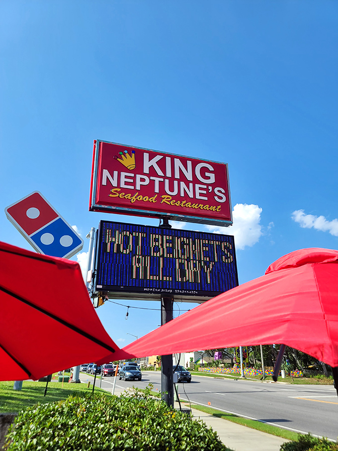 The beacon of deliciousness! This sign is like a lighthouse, guiding hungry souls to a safe harbor of scrumptious seafood.