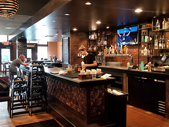 Behind every great burger is a dedicated bartender, crafting the perfect pint to complement your meal. The unsung heroes of our dining pleasure.