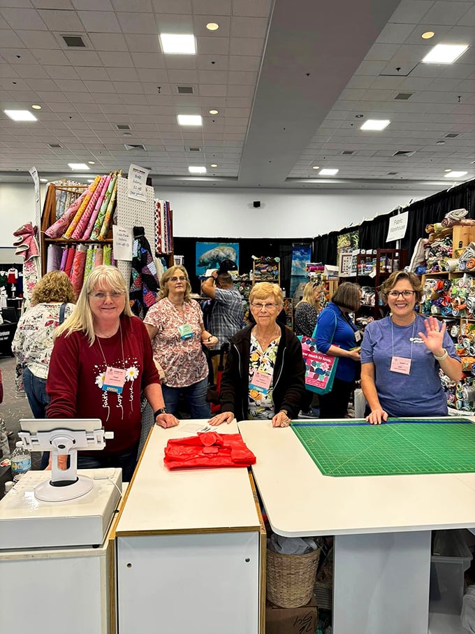 The fabric evangelists who can convert "I just need one yard" shoppers into "I'm building a craft room" enthusiasts with encyclopedic textile knowledge.
