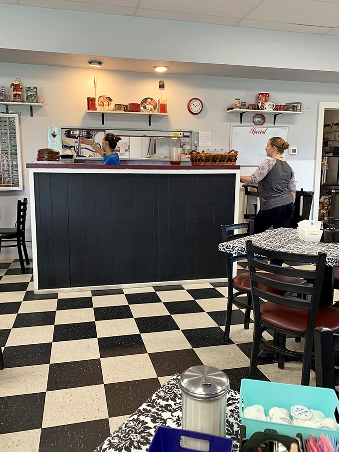 The pass-through window&mdash;that magical portal where orders transform into plates of joy carried by the unsung heroes of comfort food.