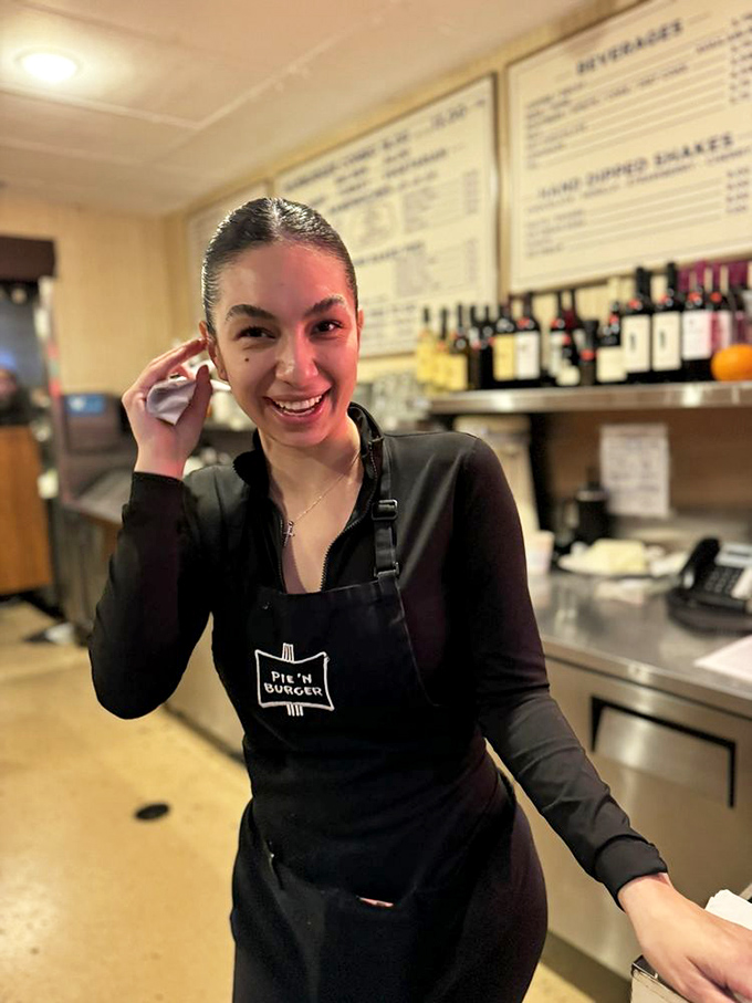 The staff doesn't just serve food—they're custodians of tradition, guardians of flavor, and masters of the perfect burger flip.