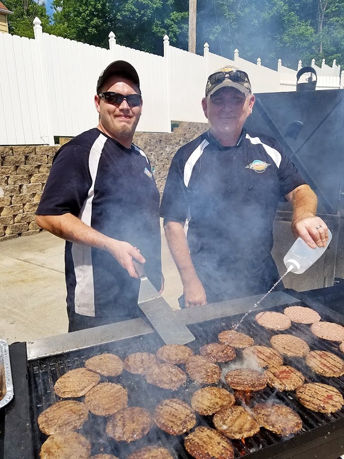 Masters of smoke and fire, working their craft with the confidence that comes from knowing exactly what they're doing.