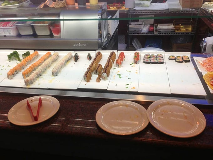 Sushi lineup ready for the taking&mdash;no waiting for the chef's attention or approval. Instant gratification for your raw fish cravings.