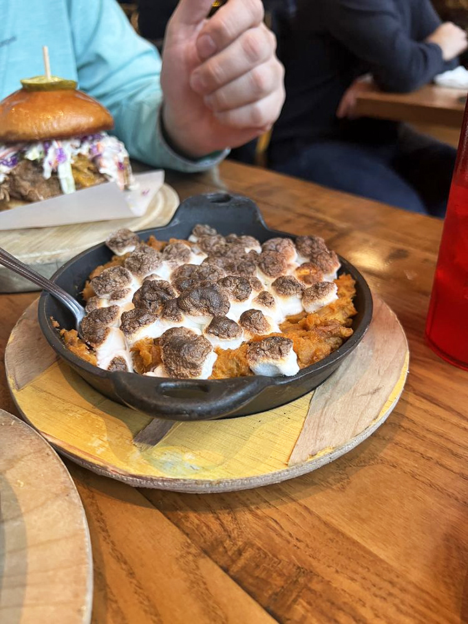 Sweet potato casserole with a marshmallow top hat. It's technically a side dish, but we all know it's dessert in disguise.