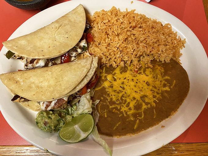 These Tacos de Alambre aren't just served&mdash;they're presented with the confidence of a dish that knows exactly how delicious it is. 