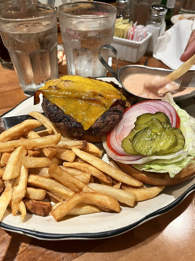 This isn't just a burger&mdash;it's a steakhouse flexing its beef muscles in handheld form. Those fries aren't sides; they're supporting actors deserving their own award.