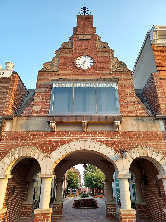 The Klokkenspel's arched entryway feels like a portal to another world, where time is marked by brick, mortar, and European charm.