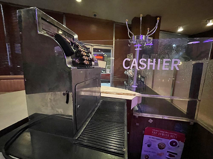 Behind this vintage cashier station, countless late-night confessions and morning-after stories have been exchanged. If these walls could talk, they'd probably order a Reuben.