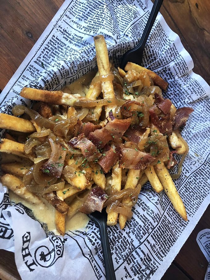 These aren't just fries&mdash;they're a carefully engineered flavor delivery system. Crispy exteriors give way to fluffy centers under savory toppings.