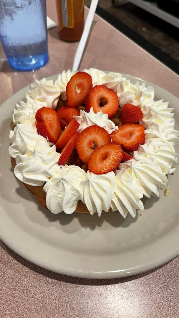 Not a dessert, but a celebration &ndash; fresh strawberries nestled in whipped cream that's performing a delicate balancing act between decadence and restraint.