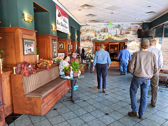 The entryway where anticipation builds with every step. That mural silently promises the meal of your dreams is just moments away.