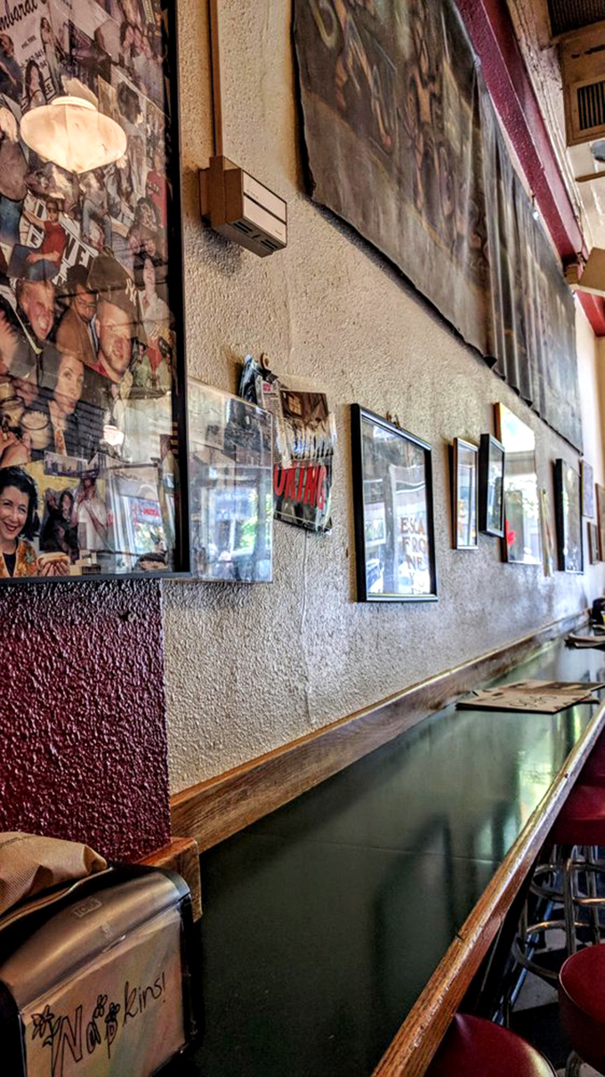 The walls tell stories through layers of photos and memorabilia&mdash;a visual history accumulated organically over years, not curated by a design firm.