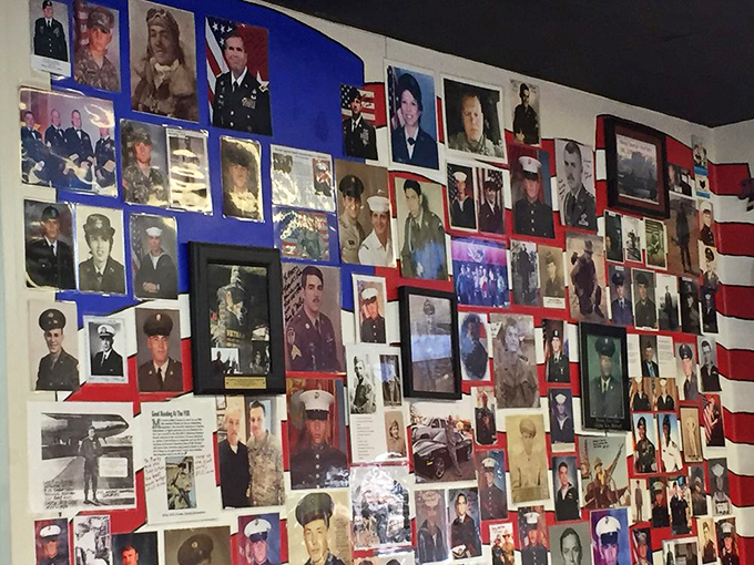 The wall of honor showcases local heroes, creating a backdrop of community pride that seasons every meal with a dash of patriotism.