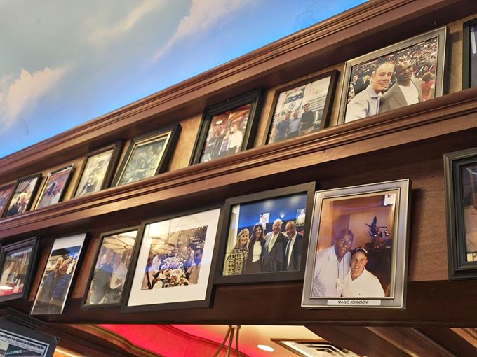 Wall of fame showcasing celebrity visitors who couldn't resist the siren call of mile-high cakes and all-day breakfast.