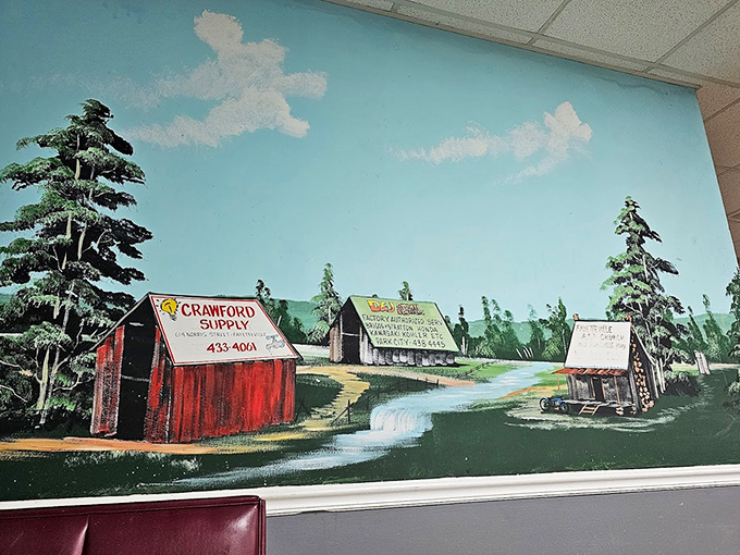 The wall mural showcases local landmarks, reminding diners they're experiencing a true piece of Tennessee. Art that tells you where you are.
