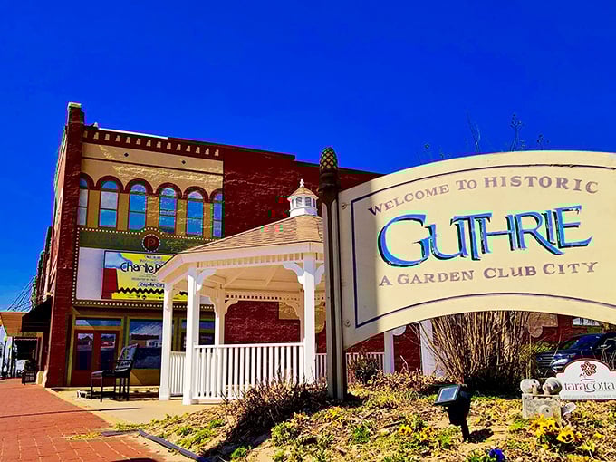 Guthrie announces itself as "A Garden Club City" with Victorian charm. This welcoming gazebo sets the stage for the time-travel experience ahead.