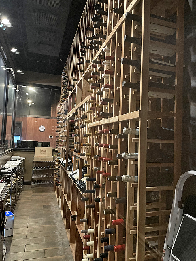 Not just a wine collection—it's a wooden library of fermented grape stories, each bottle waiting for the right dinner conversation to join.