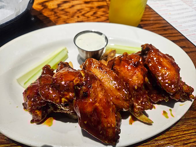 These wings aren't just appetizers&mdash;they're a sticky, sweet-heat preamble to the main event. Napkins required, restraint optional.
