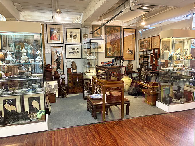 Asian-inspired pieces and fine wood furniture create a sophisticated display. Someone's living room is about to get significantly more interesting.