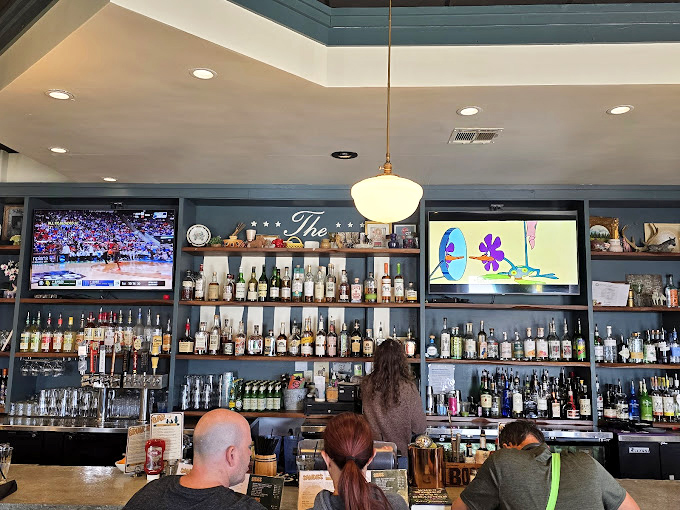 Behind that impressive bar, local beers flow and craft cocktails come to life. The perfect liquid companions to sandwiches that demand to be celebrated properly.