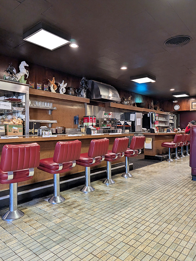 The counter seating offers front-row tickets to the best show in town&mdash;watching short-order mastery unfold while perched on those classic red vinyl stools.