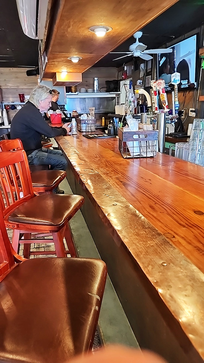 The bar at Bernie's&mdash;where wooden surfaces tell stories of countless elbows, toasts, and "you've got to try this" conversations.