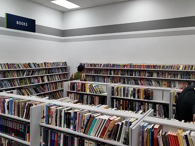 The book section: a literary buffet where cookbooks and crime novels share shelf space. Bibliophiles, prepare to lose track of time.