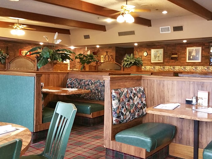 These booths have cradled more family celebrations, first dates, and food comas than any therapist's couch in Wichita.