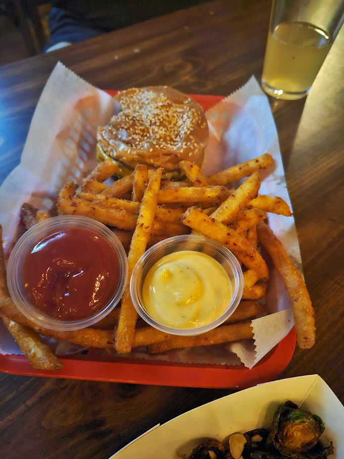 This burger and seasoned fries combo isn't just food – it's strategic gaming fuel designed for one-handed eating between rounds.