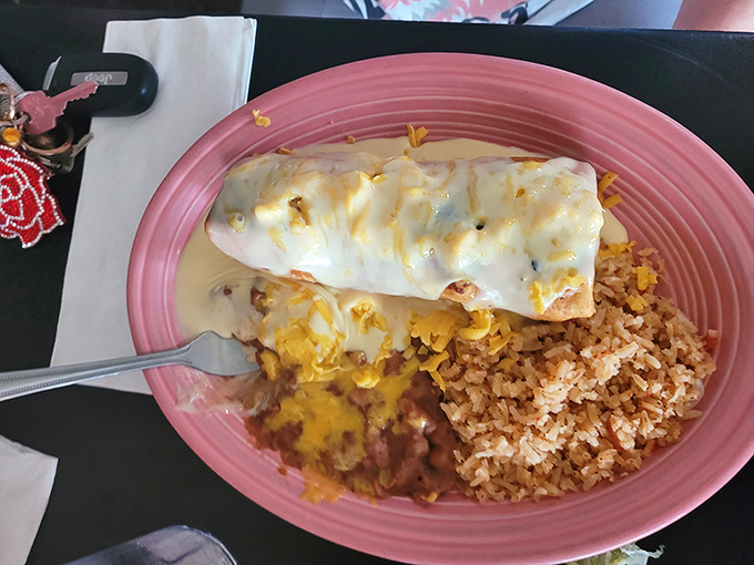 This isn't just a burrito—it's a carefully constructed landscape of flavors with rice and beans as worthy supporting characters.