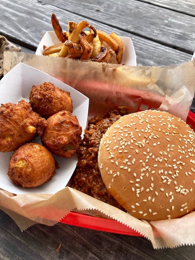 A burger that deserves its own ZIP code. Paired with golden fries and those legendary hush puppies, it's a Southern trifecta of deliciousness.
