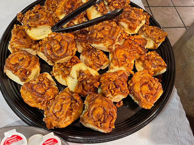 These aren't just cinnamon rolls; they're spiral-shaped happiness, glazed with the kind of sweetness that makes Monday mornings bearable.