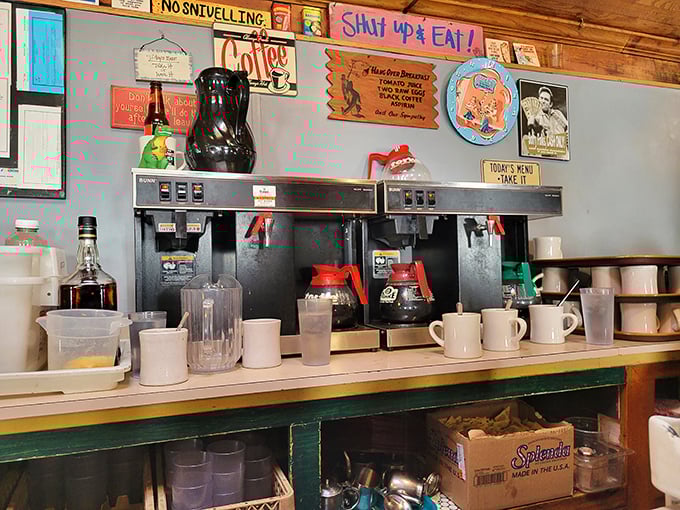 Coffee station that means business. The "Shut Up & Eat!" sign isn't just decoration&mdash;it's the diner's philosophical statement on morning happiness.
