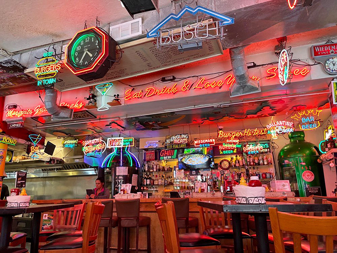 Part bar, part museum of illuminated Americana, the counter area glows with the promise of drinks and conversation.