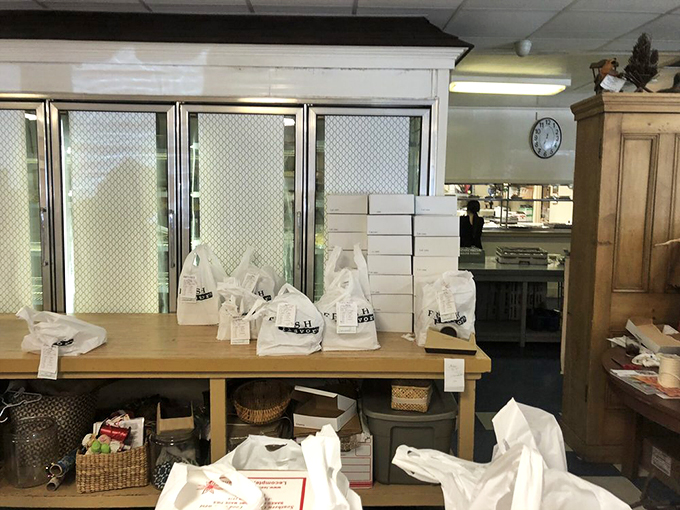 Where to-go orders await their journey home &ndash; though many pies never make it past the parking lot before the first slice disappears.