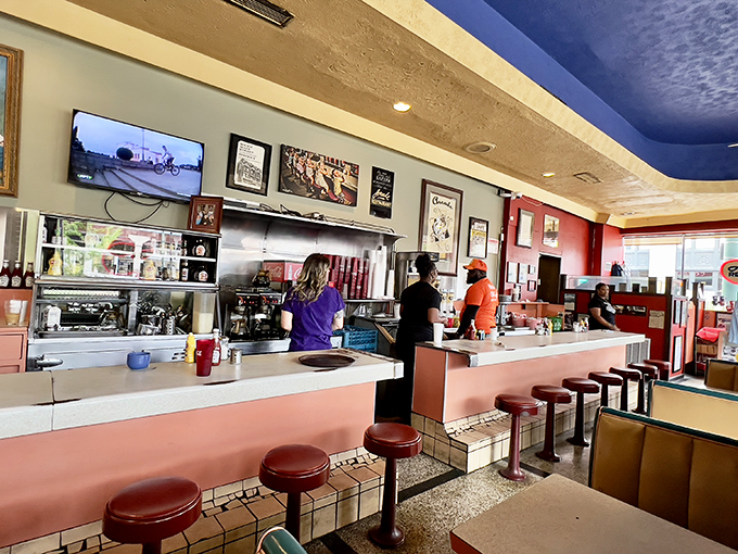 The counter where strangers become neighbors and regulars become family, all under the watchful eye of a staff that's seen it all.
