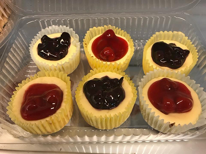 These mini cheesecakes with fruit centers aren't trying to be trendy; they're too busy being delicious in their simple plastic container.