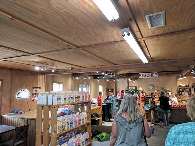 The bustling interior where peach pilgrims gather. That "PEACHES" sign isn't just decoration&mdash;it's more like a sacred text to the faithful.